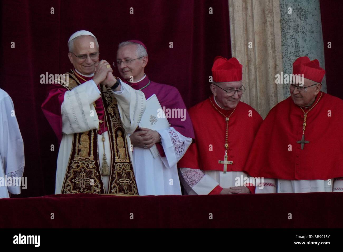 Pope Leo XIV appears on the balcony of St Peter's Basilica after his ...
