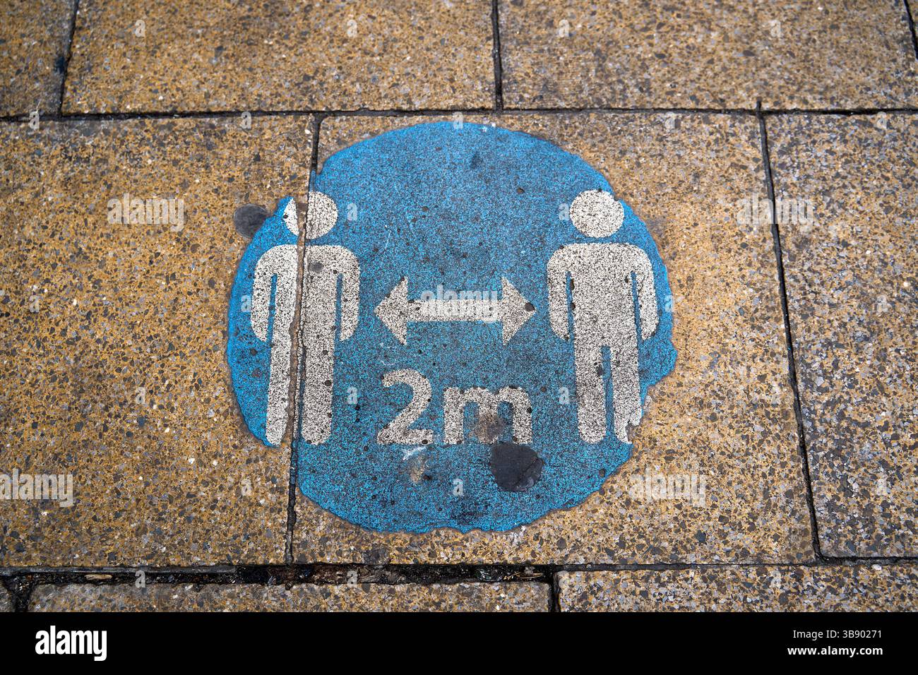 Liverpool, United Kingdom - May 4, 2025: Worn marking on the sidewalk ...