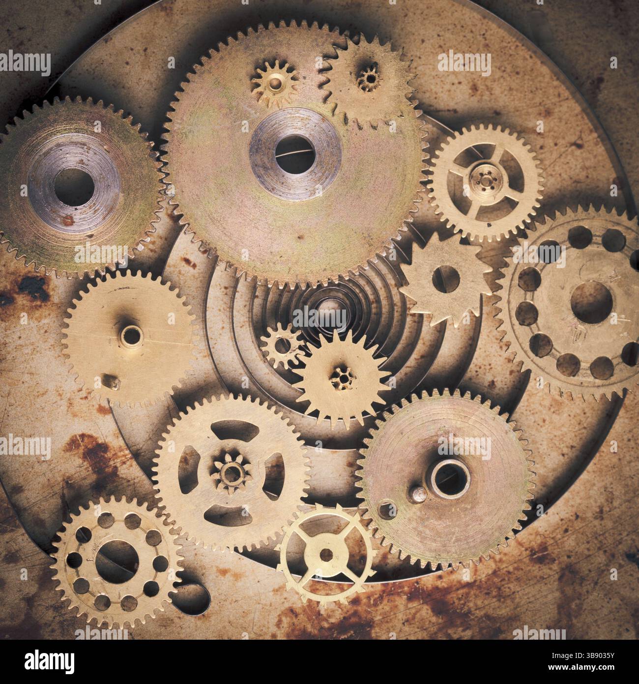 Steampunk background from mechanical clocks details over old metal ...