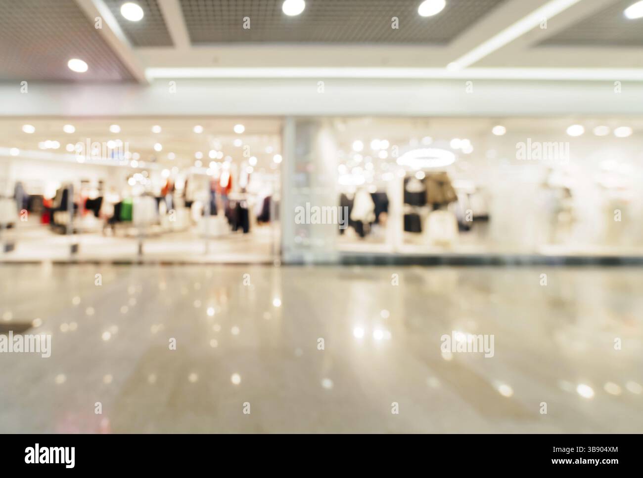 Shopping mall blur background with bokeh. Blurred hall of shopping mall ...