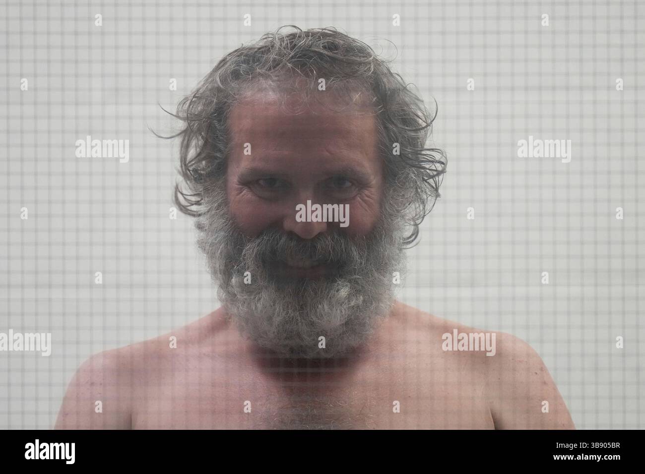 Jimmy Wayne Carwyle smiles during an arraignment in Los Angeles ...