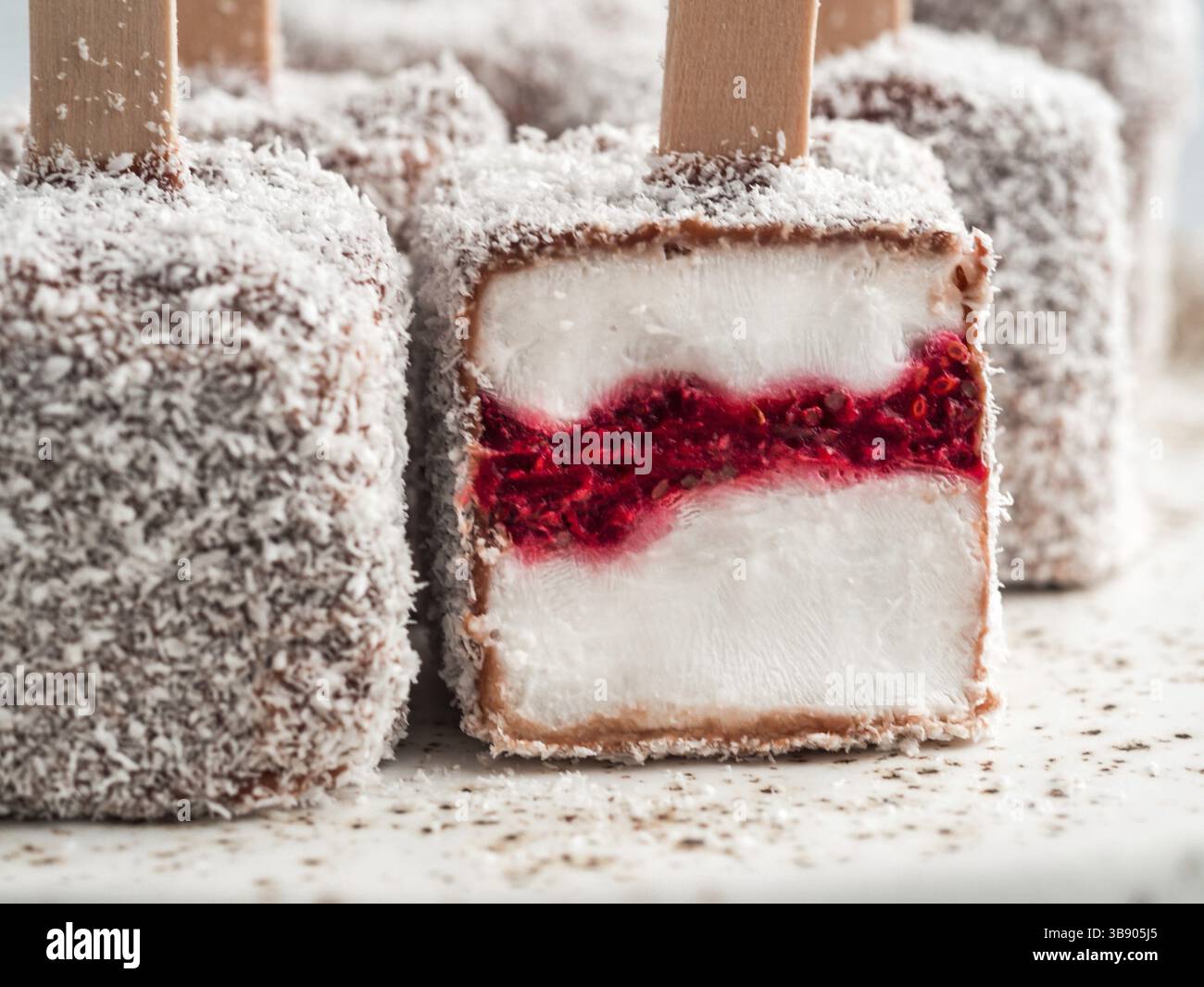 Homemade raw lamington ice cream pops on light background. Australian ...