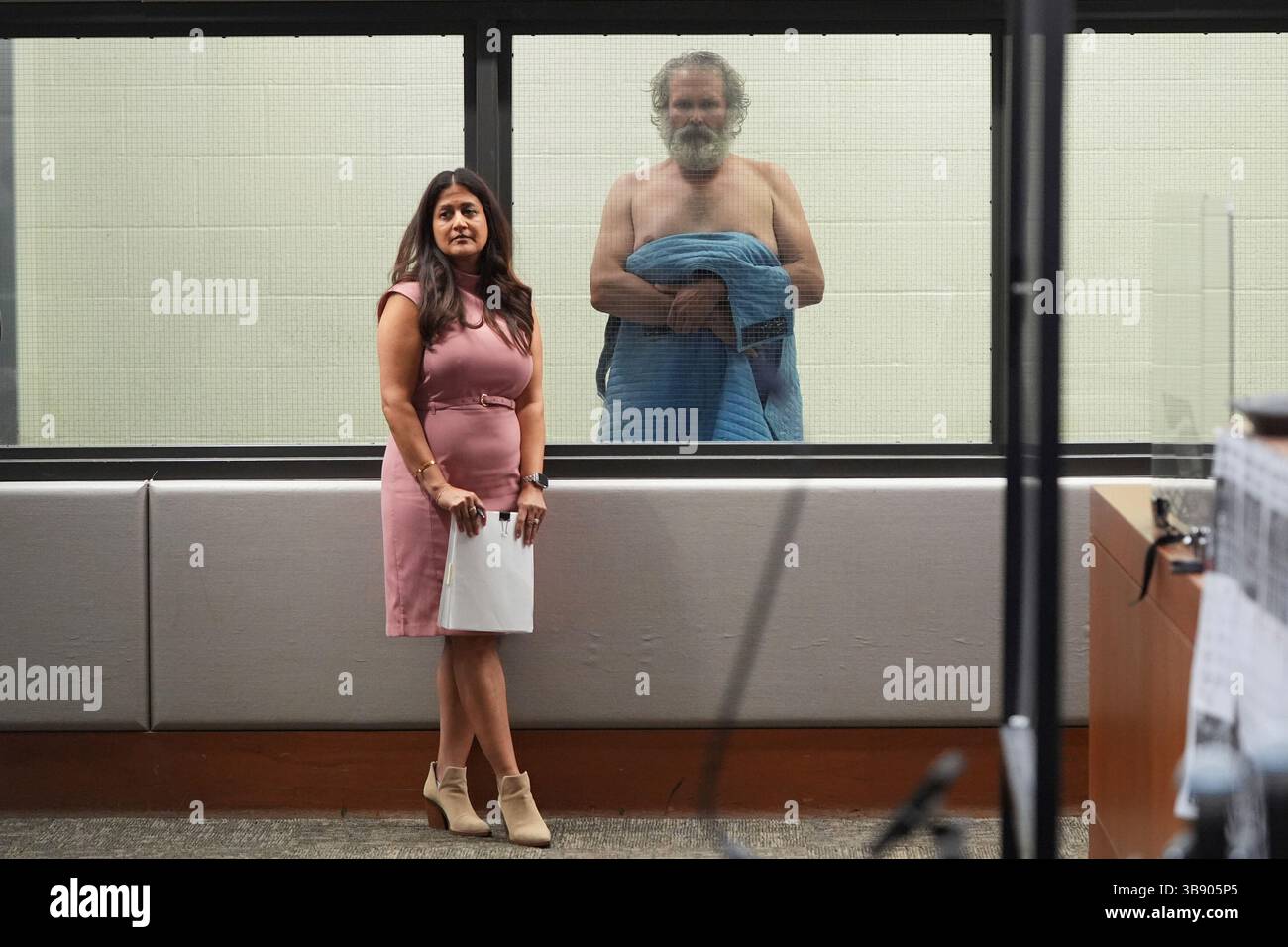 Jimmy Wayne Carwyle, right, appears during an arraignment with attorney ...