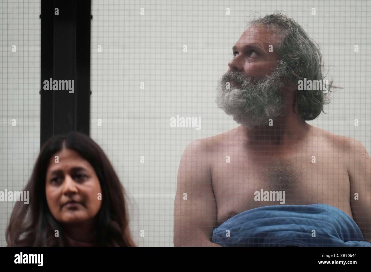 Jimmy Wayne Carwyle, right, appears during an arraignment with attorney ...