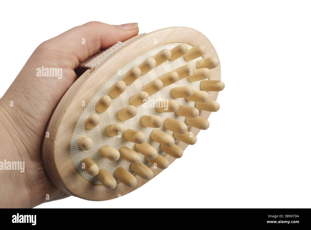 Bath anti-cellulitis spa massage brush in hand isolated on white ...