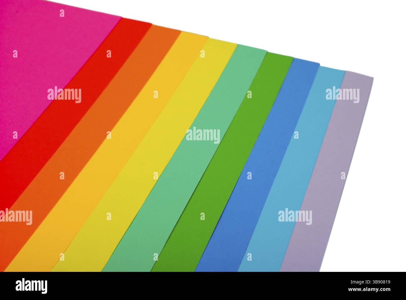 Various color paper stack like a rainbow isolated on white Stock Photo ...