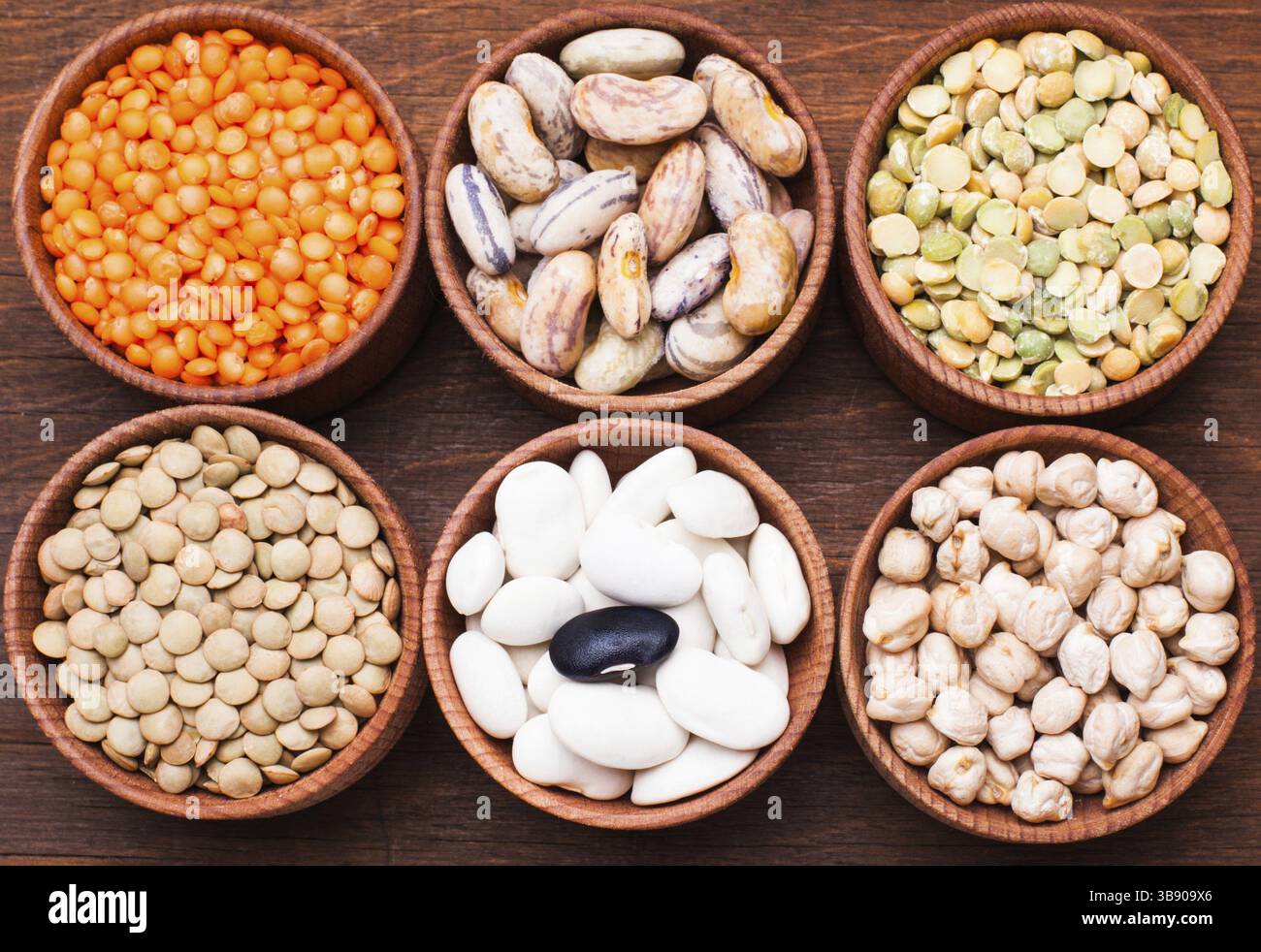 Different types of beans in wooden bowls Stock Photo - Alamy
