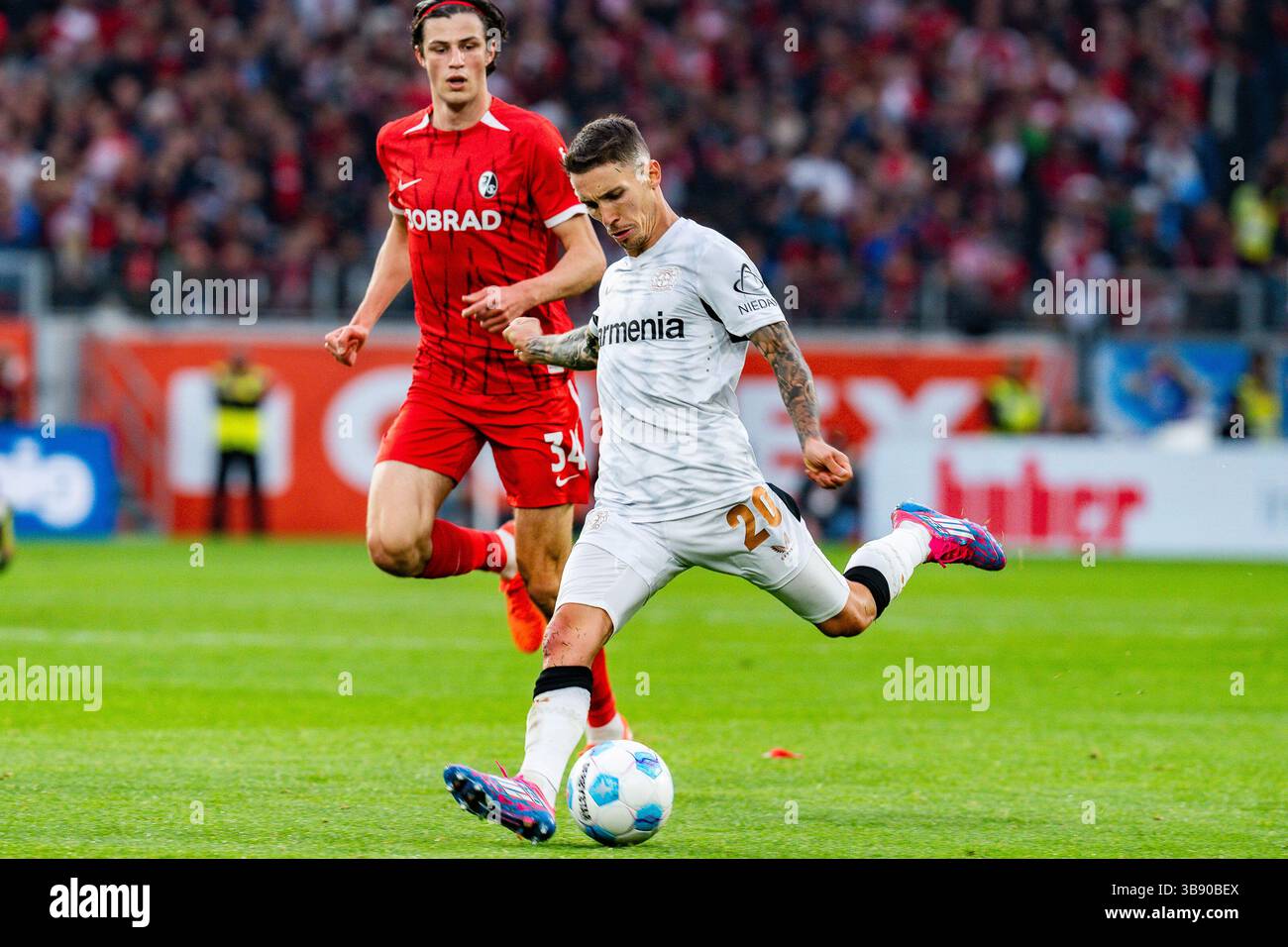 Freiburg, Deutschland. 04th May, 2025. Alejandro Grimaldo (Bayer 04 Leverkusen, #20) Merlin ...