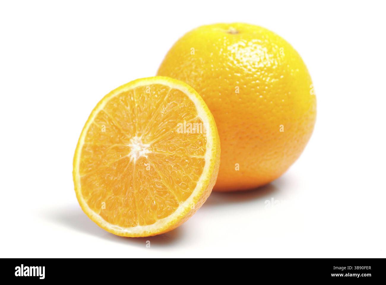 Orange fruit with half part isolated on white background Stock Photo ...