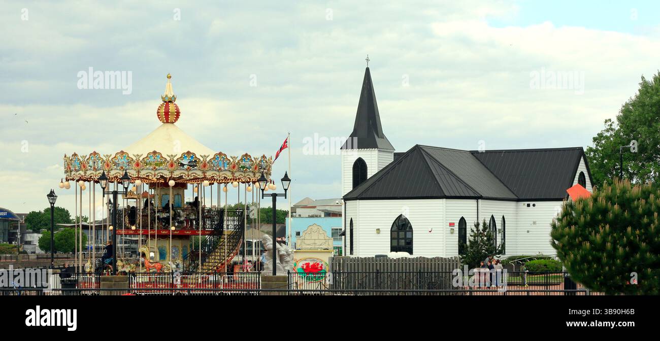 The Norwegian Church, Cardiff Bay with carousel fairground ride. Taken ...