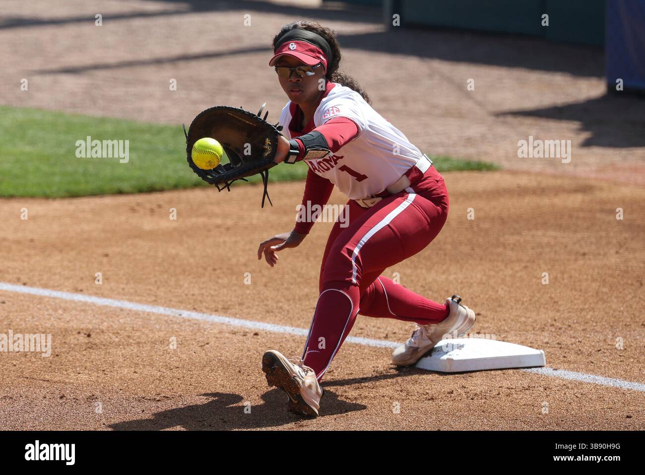 ATHENS, GA - MAY 08: Oklahoma first baseman Cydney Sanders (1) catches ...