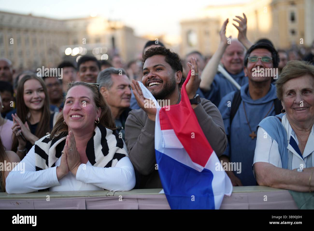 Faithful listen the speech of the newly elected Pope Leo XIV at the ...