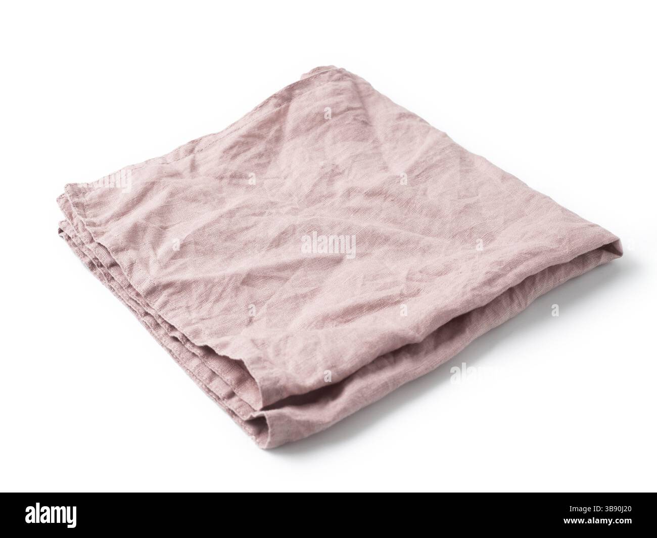 Side view on folded old rose color linen napkin isolated on white ...