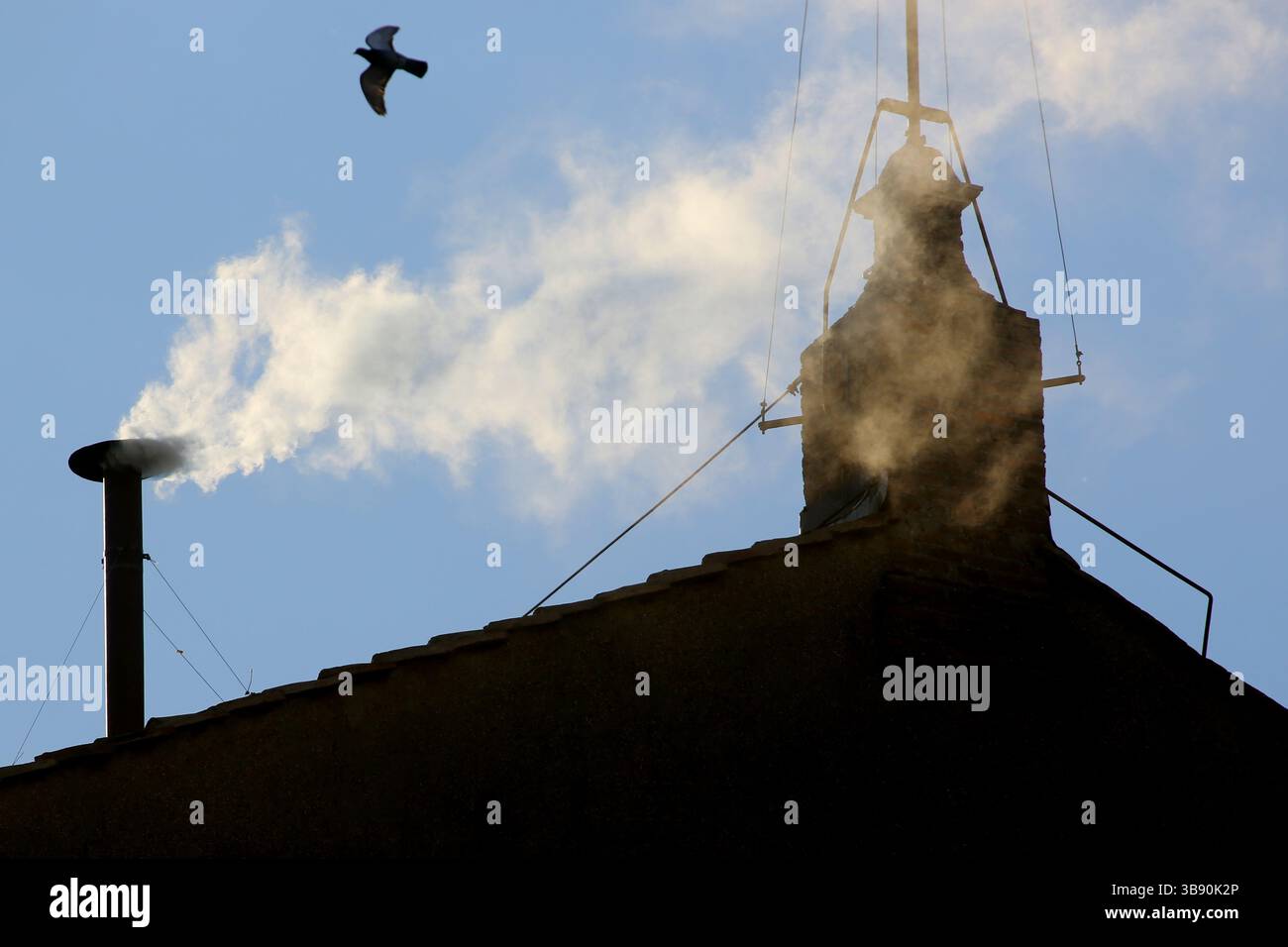 VATICAANSTAD - White smoke from the chimney of the Sistine Chapel. A ...