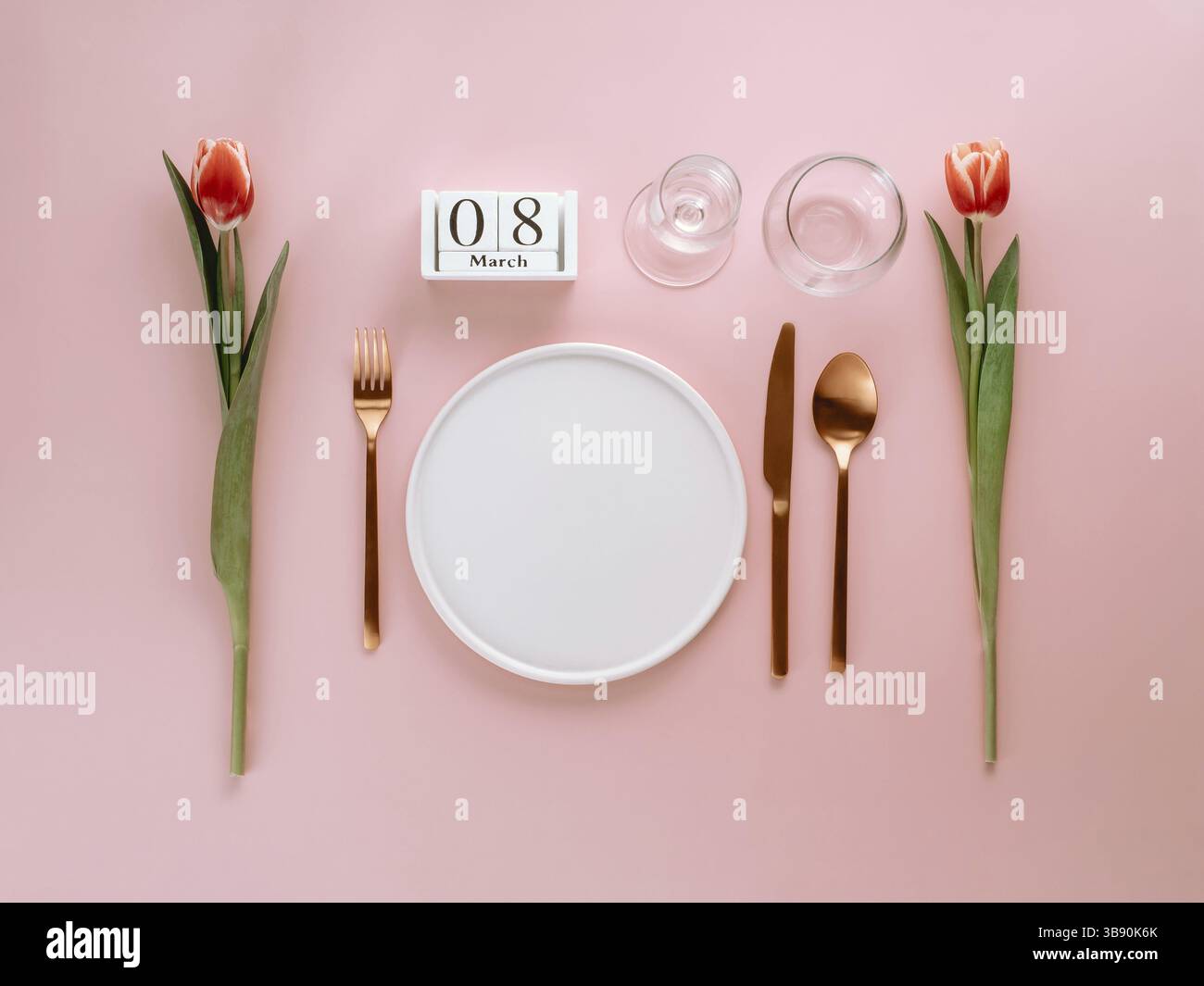 8 march table setting. Empty white plate, calendar with march eight ...
