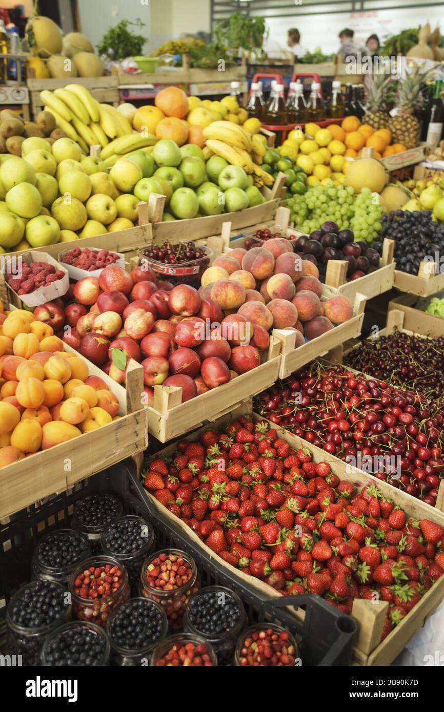 Various fresh fruits in boxes on the market Stock Photo - Alamy