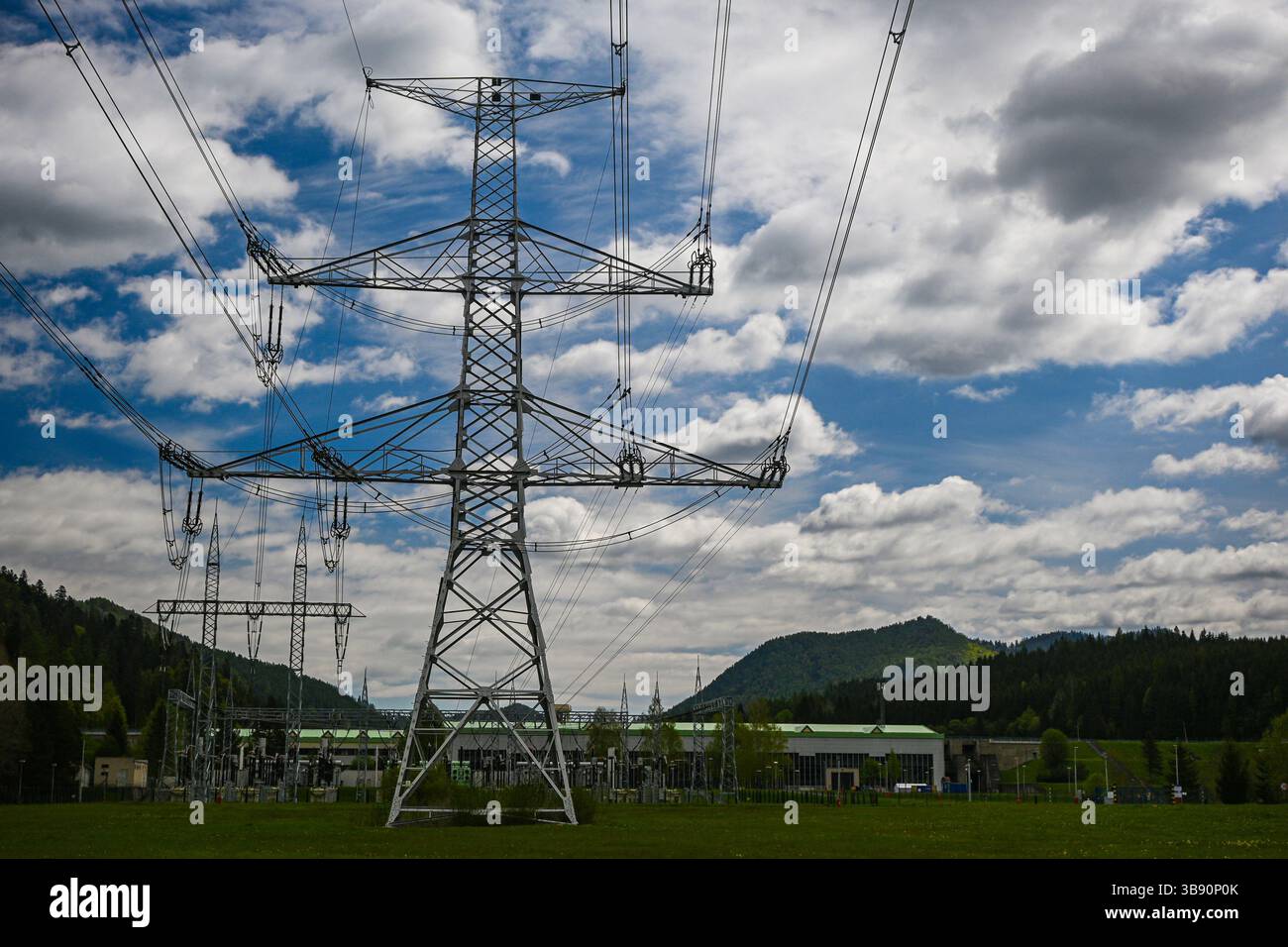 High-voltage power lines supplying electricity to a distribution ...