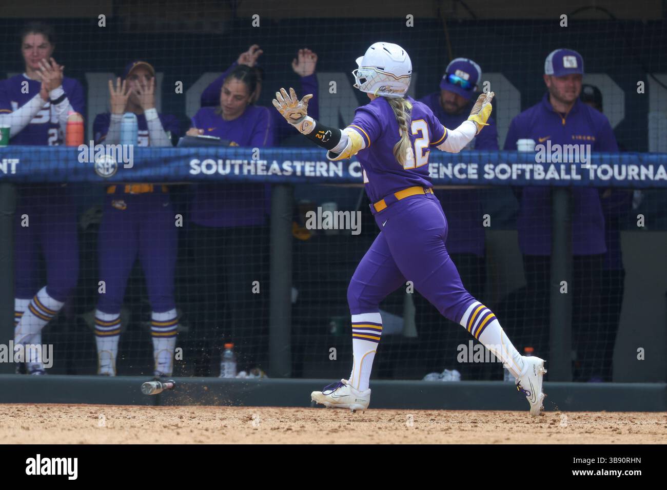 ATHENS, GA - MAY 08: LSU catcher Maci Bergeron (12) gets her dugout ...
