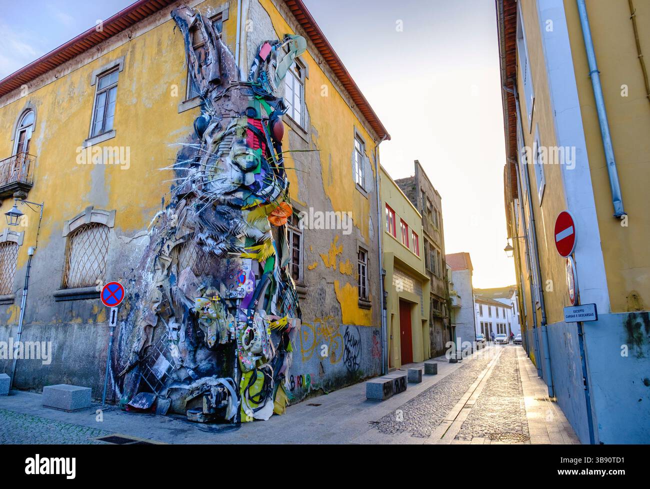 Public street art, Half Rabbit trash sculpture by Portuguese artist ...
