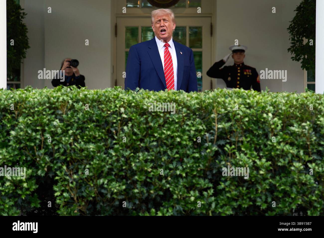 President Donald Trump speaks to reporters outside the West Wing of the ...