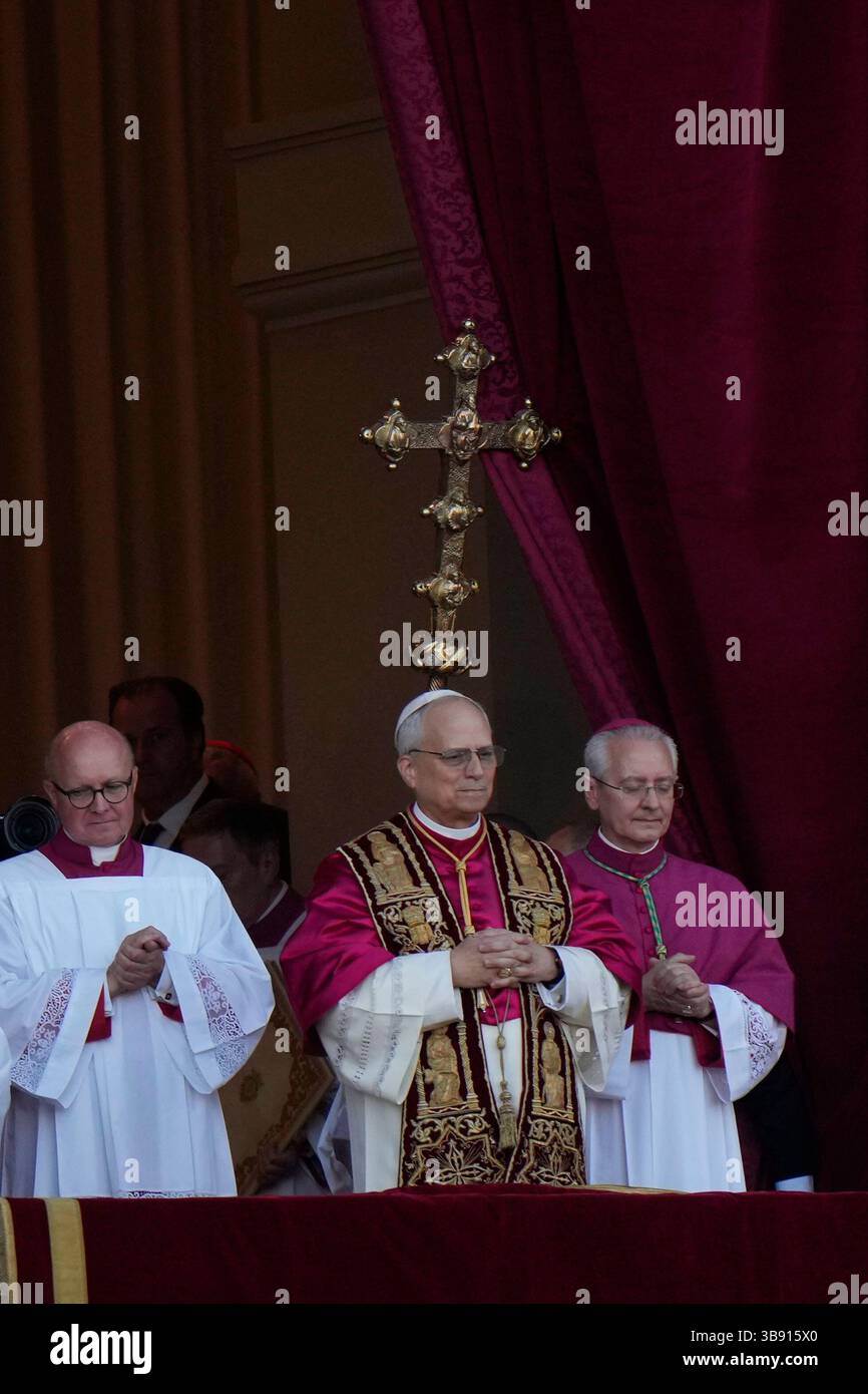 Pope Leo XIV appears on the balcony of St Peter's Basilica after his ...