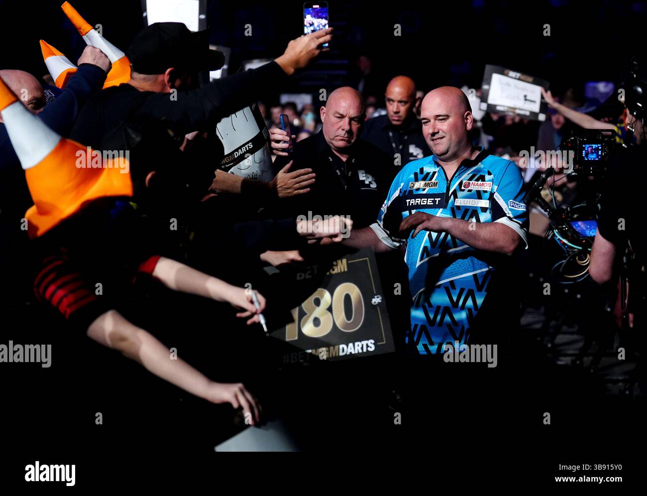 Rob Cross walks out for the match against Gerwyn Price on night ...