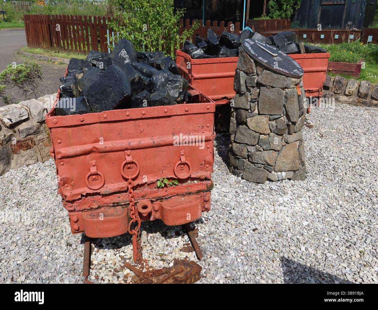 A display of miners' bogies filled with replica coal, to illustrate the ...