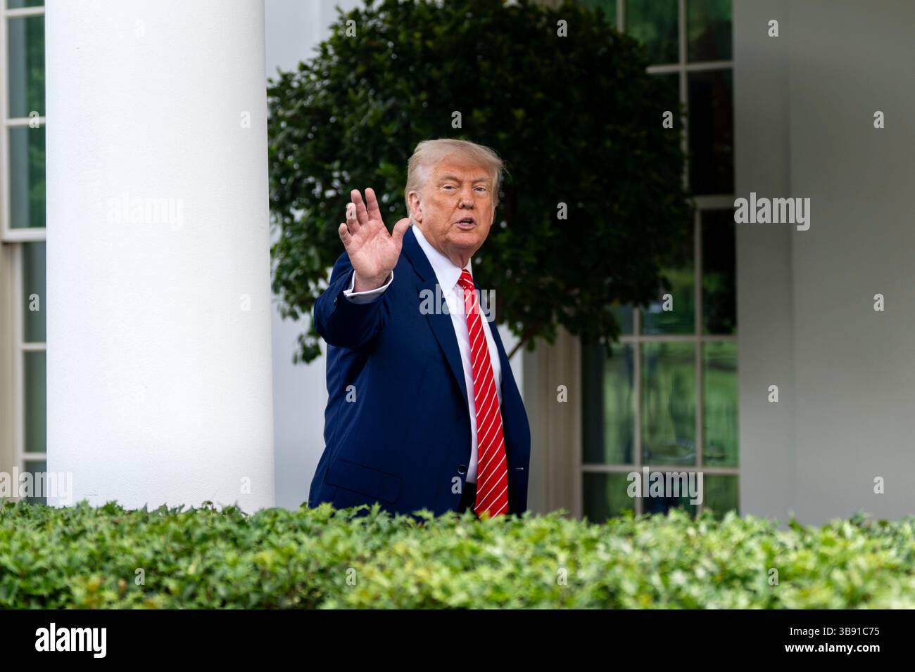 President Donald Trump speaks with reporters outside the West Wing of ...