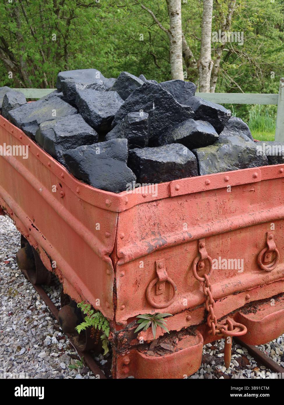 A display of miners' bogies filled with replica coal, to illustrate the ...