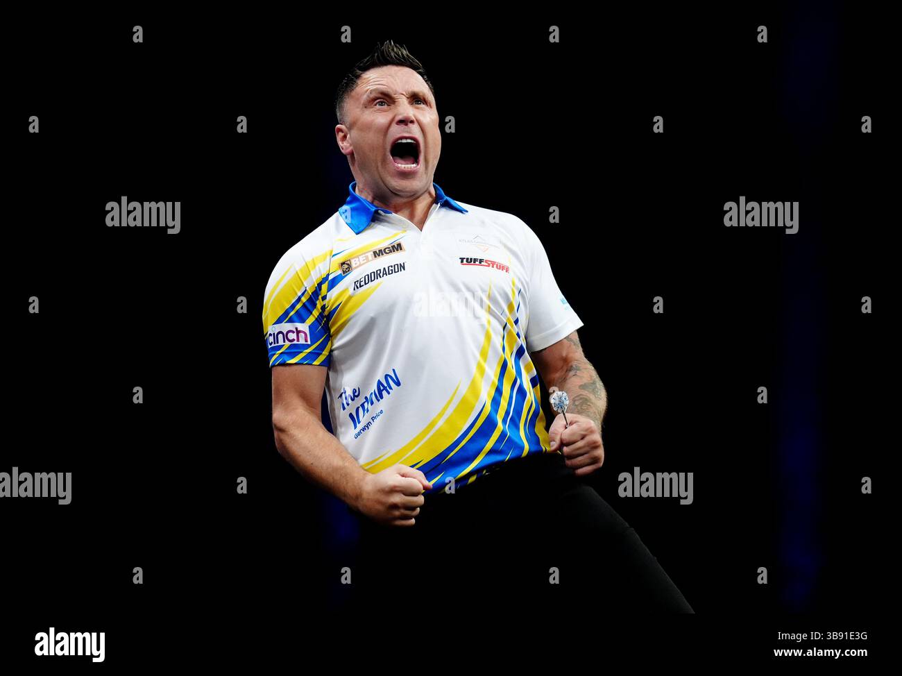 Gerwyn Price celebrates victory against Rob Cross on night fourteen of ...