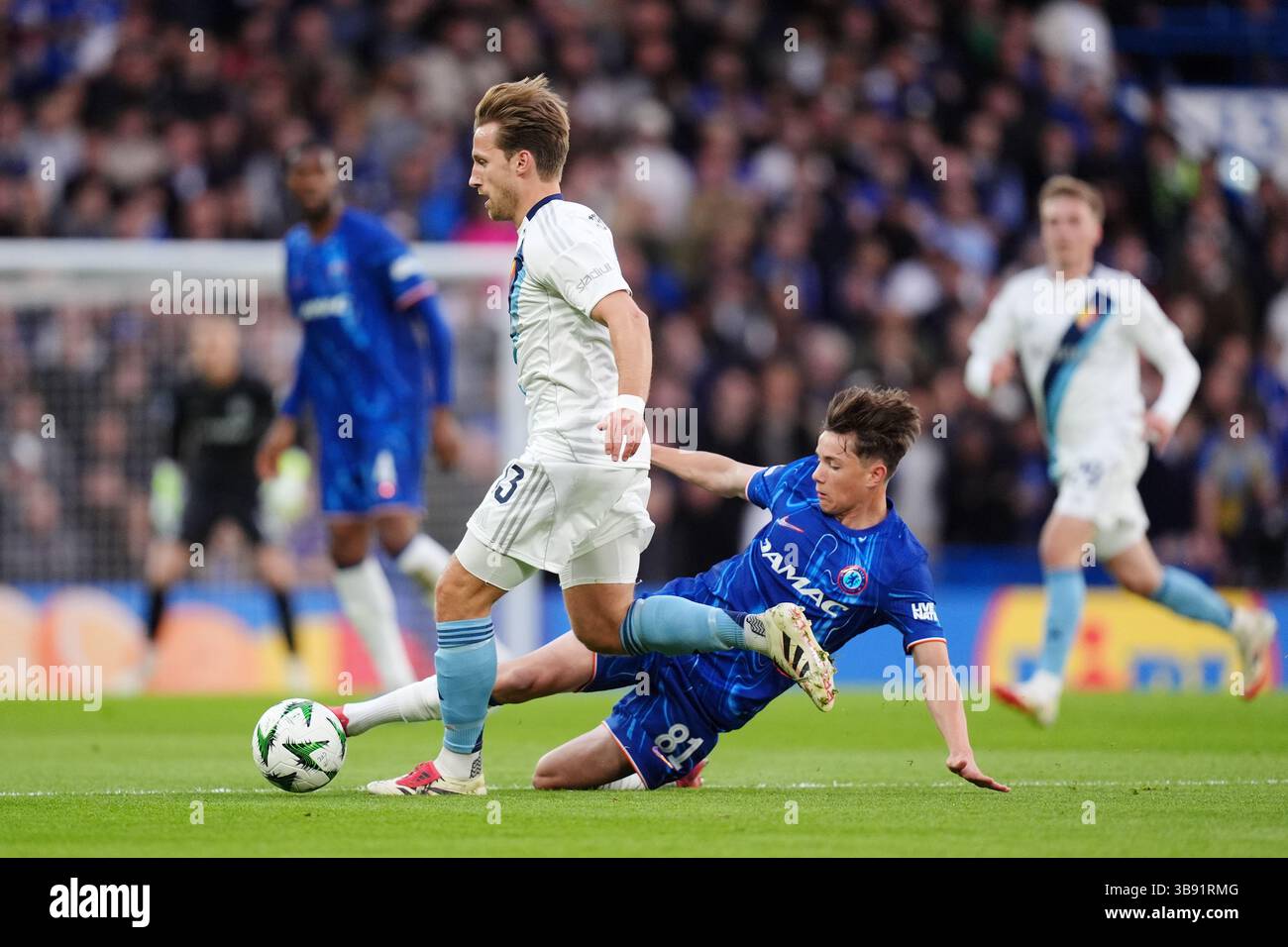 Djurgarden's Daniel Stensson (left) is tackled by Chelsea's Reggie ...