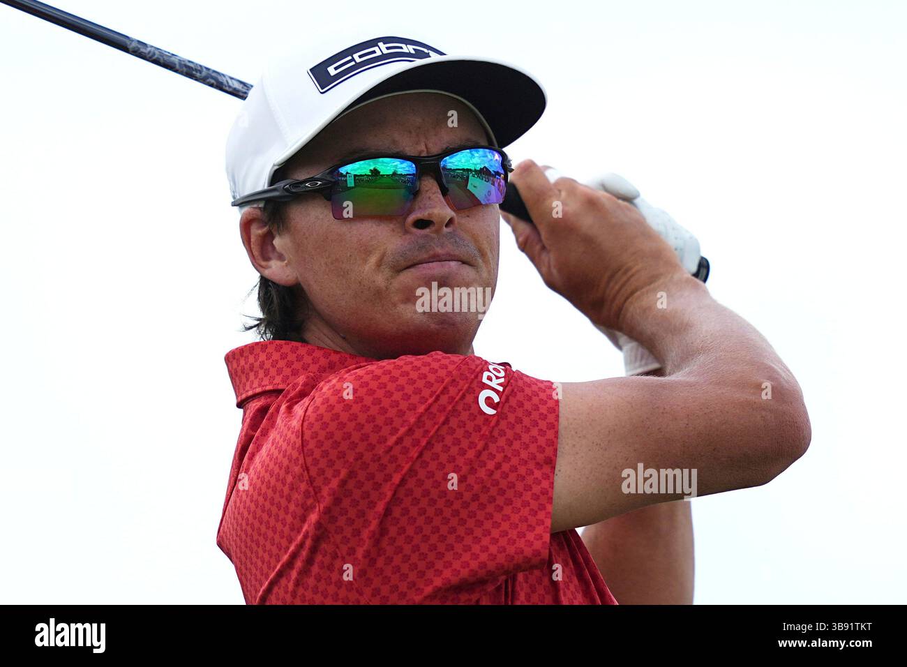Rickie Fowler watches after hitting on the 13th hole during the first ...