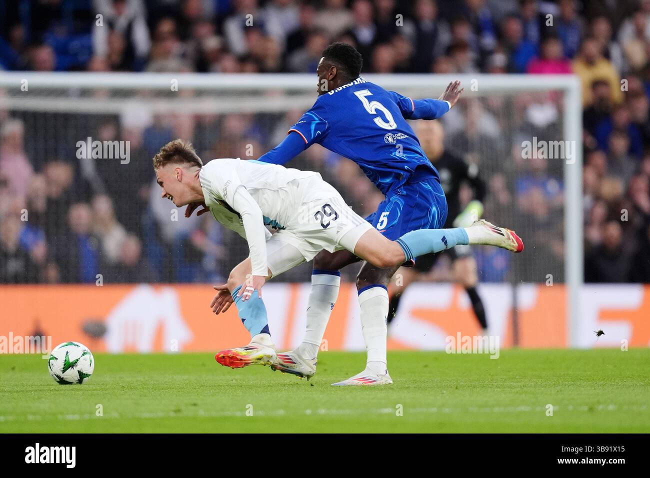 Chelsea's Benoit Badiashile (right) and Djurgarden's Santeri Haarala ...