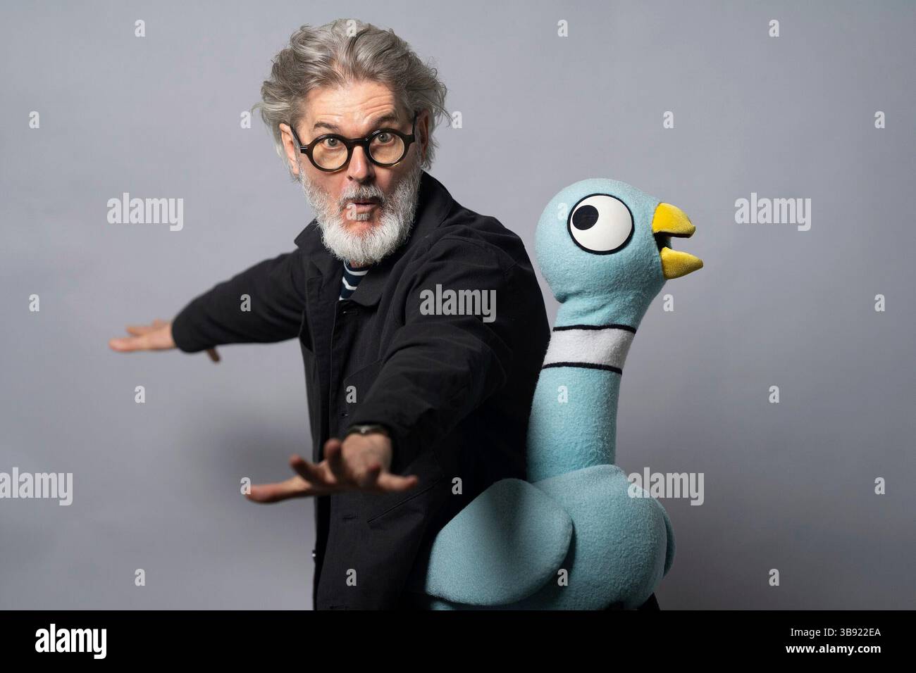 Author Mo Willems poses with The Pigeon, a character in his children's ...