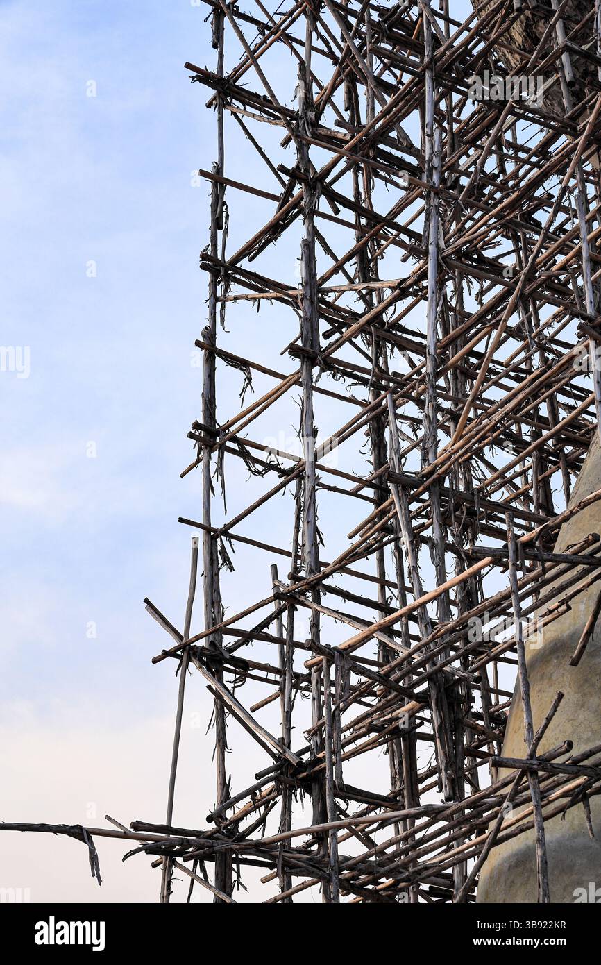 A large number of wood scaffoldings are used in construction projects ...