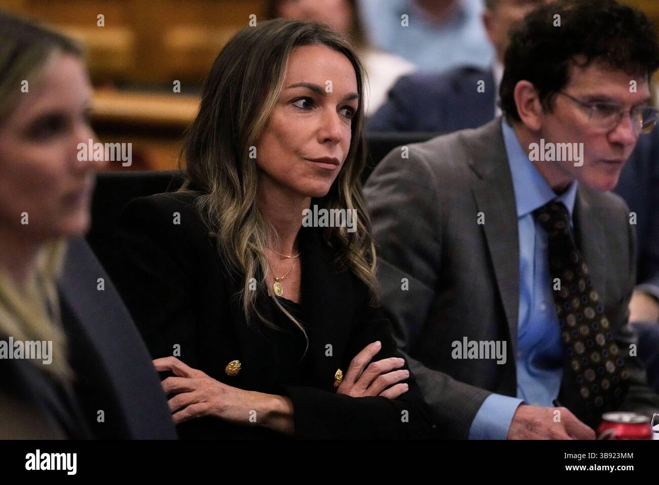 Karen Read listens as Massachusetts State Police Sergeant Yuriy ...