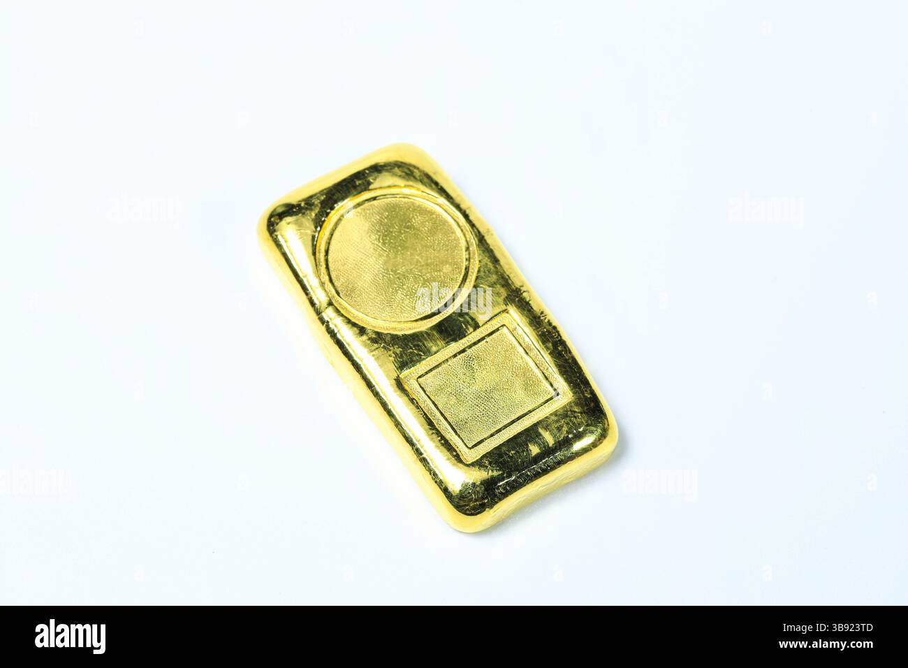 A real shiny gold bar or gold ingot isolated on white background Stock ...