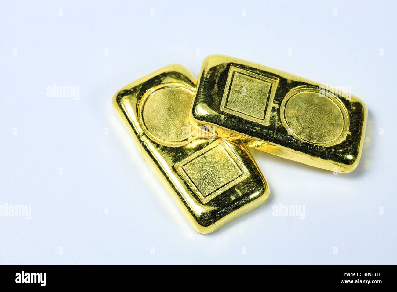 A stack of real shiny gold bar or gold ingot isolated on white ...
