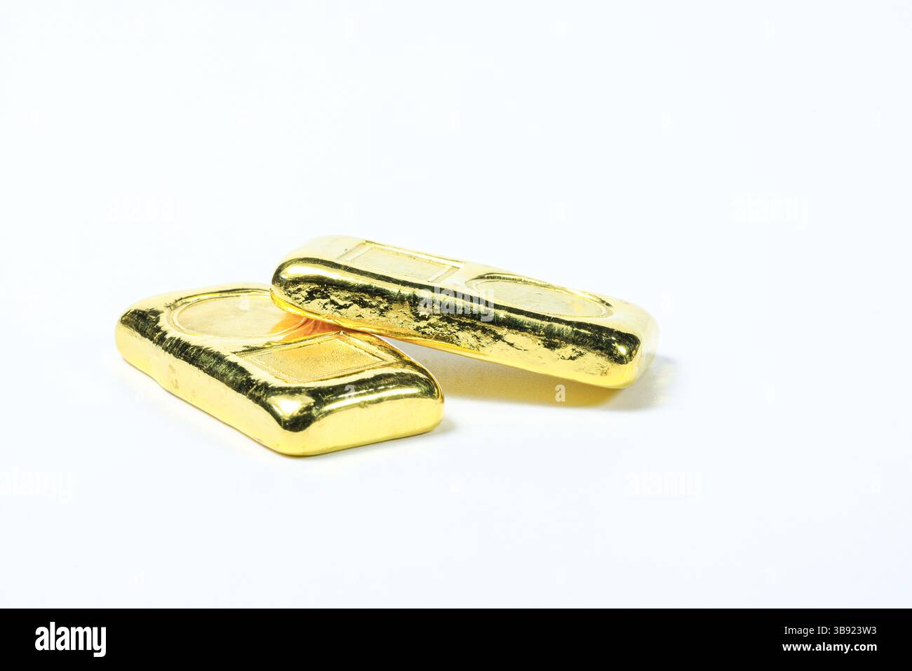 A stack of real shiny gold bar or gold ingot isolated on white background Stock Photo - Alamy