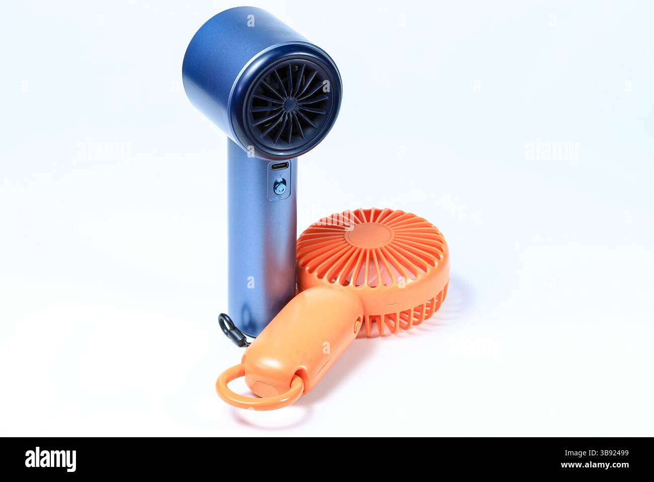 Small plastic Portable fan side view, isolated on white background ...