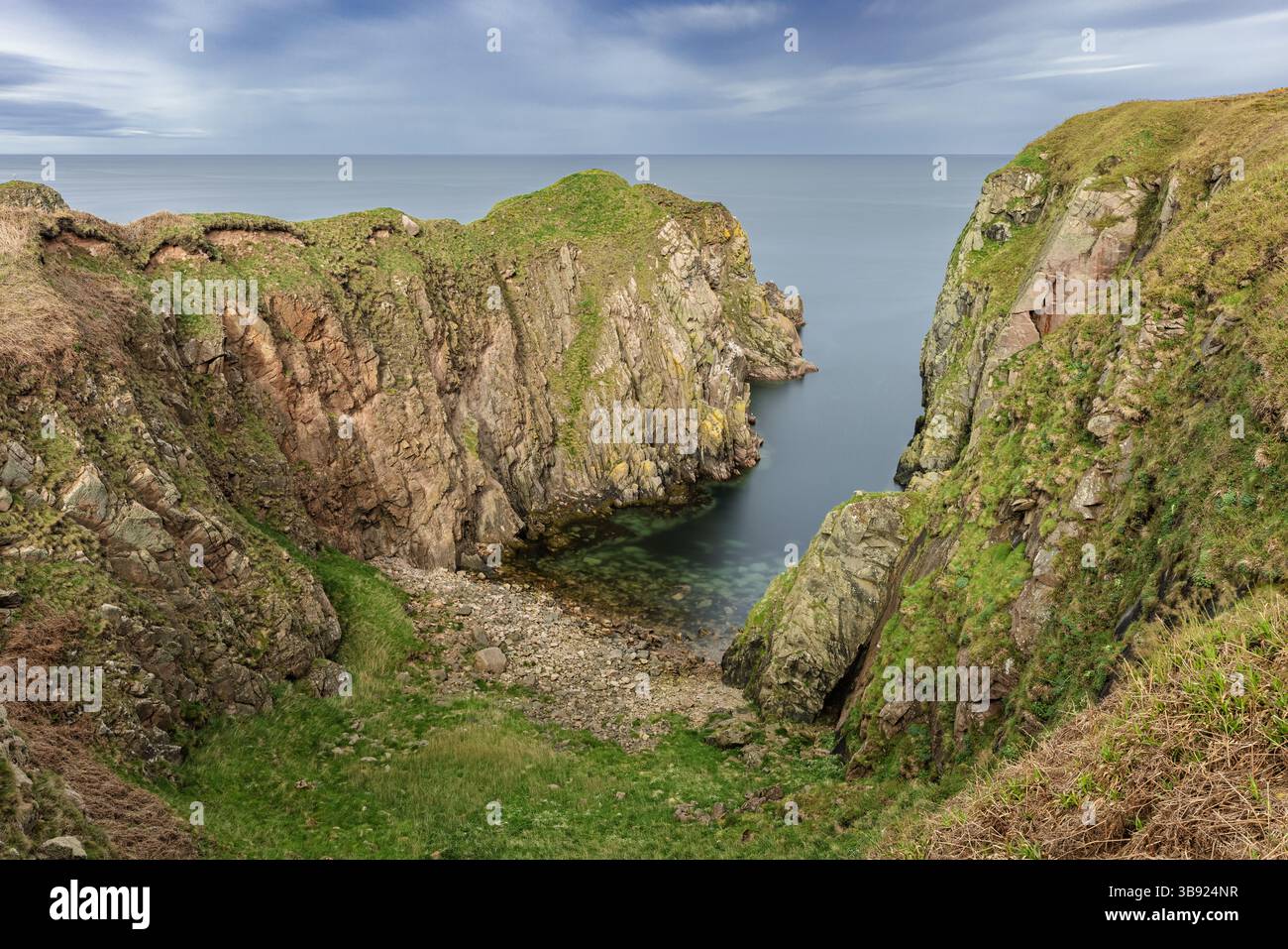 The rugged coast of Bullers of Buchan is located south of Peterhead in ...