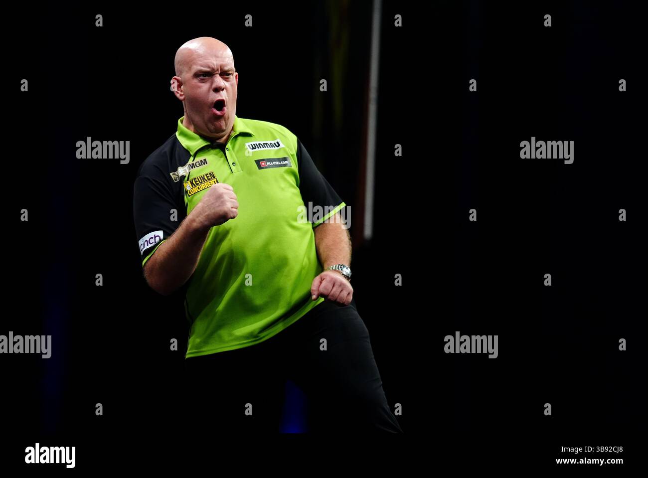 Michael van Gerwen celebrates against Luke Humphries on night fourteen ...