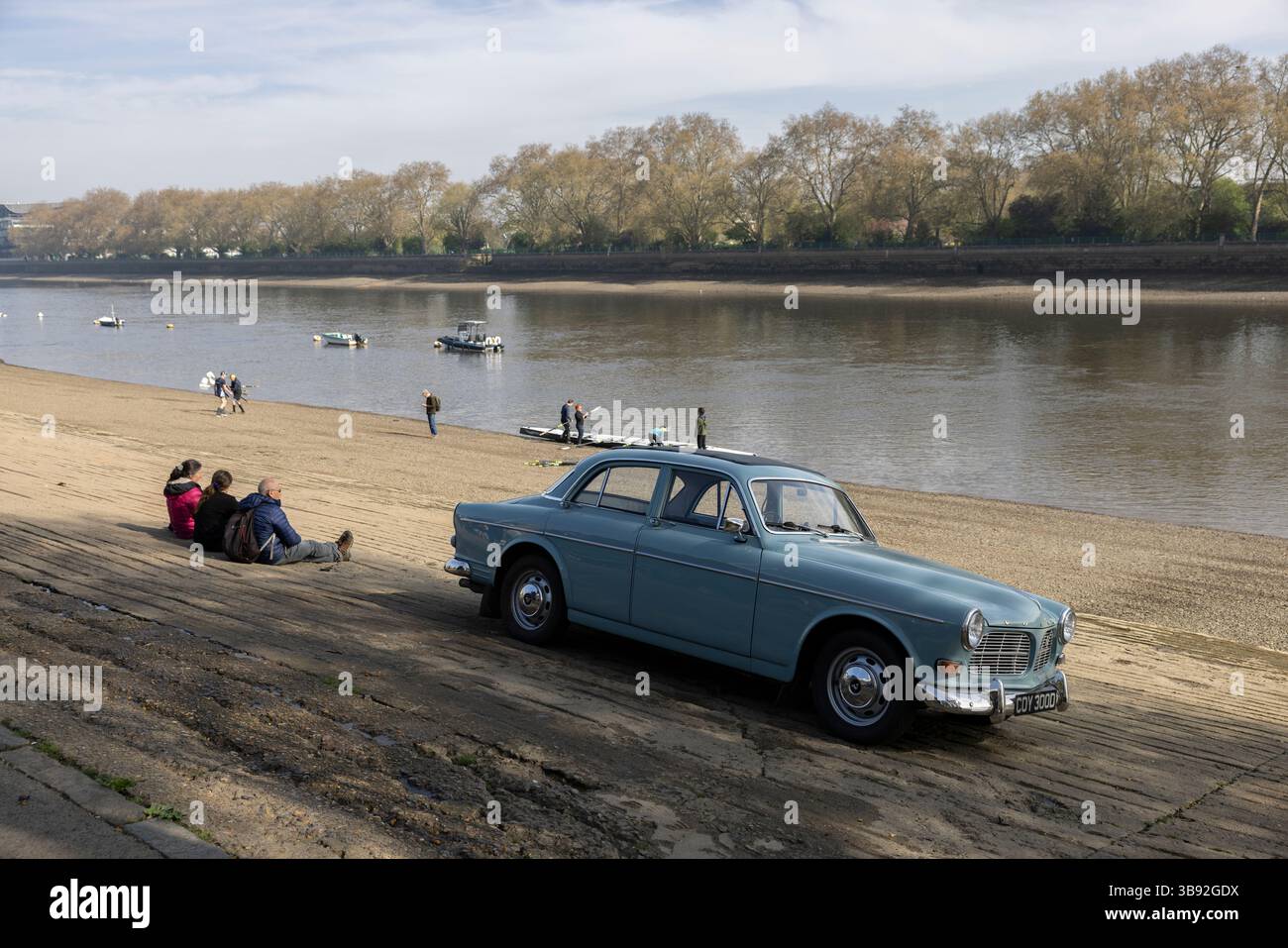 Volvo Amazon Overdrive, classic car parked on the bank of the River ...