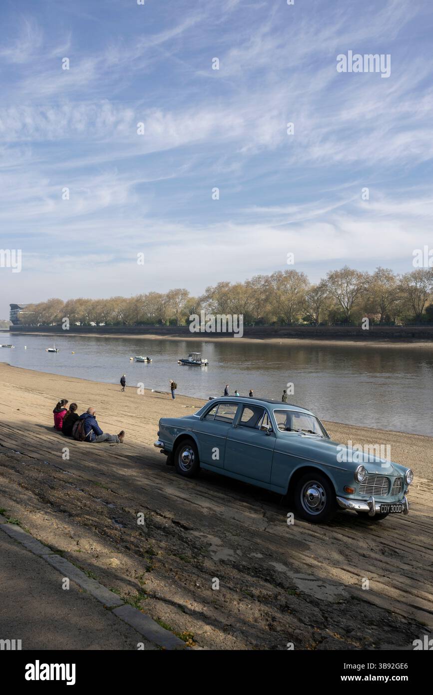 Volvo Amazon Overdrive, classic car parked on the bank of the River ...