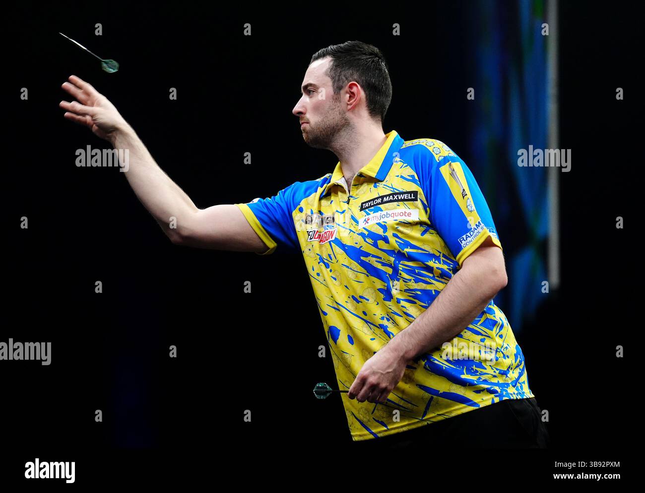 Luke Humphries in action against Michael van Gerwen on night fourteen ...