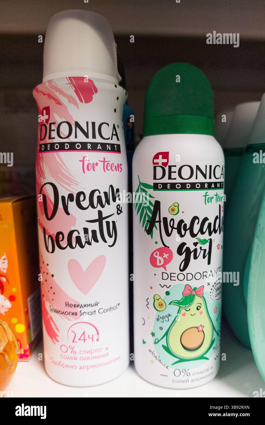 Two girls shopping in cosmetics hi-res stock photography and images - Alamy