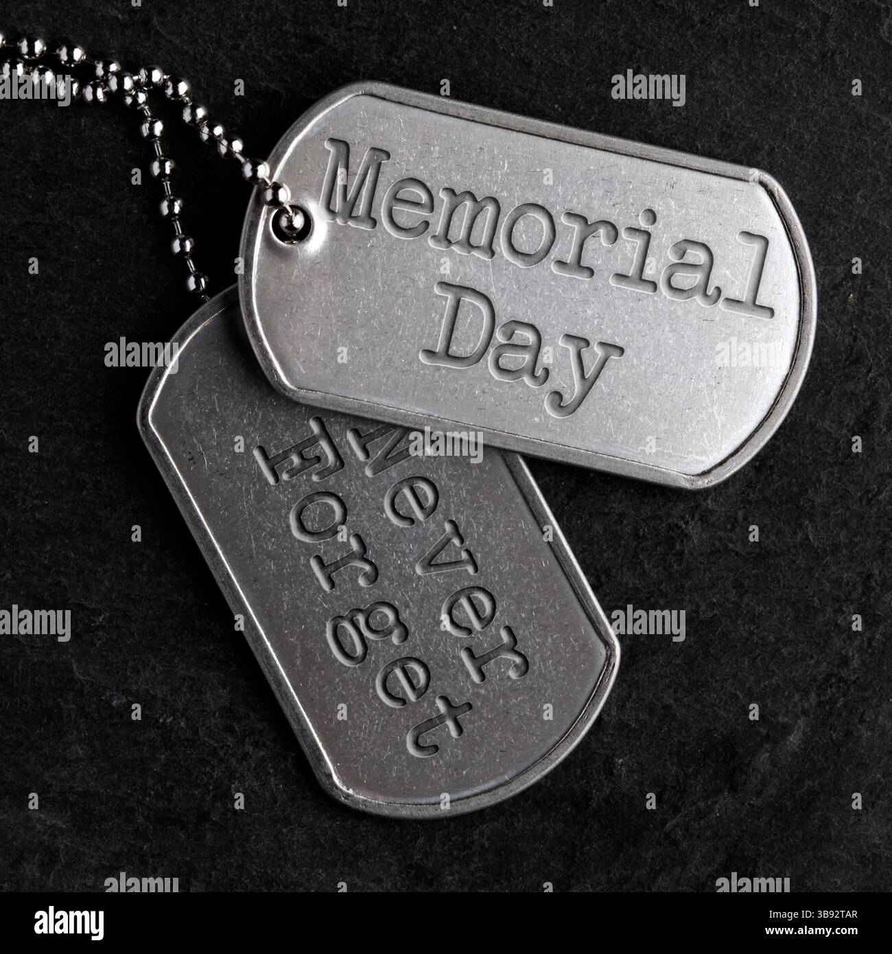 Old and worn military dog tags - Memorial Day, Never Forget Stock Photo ...
