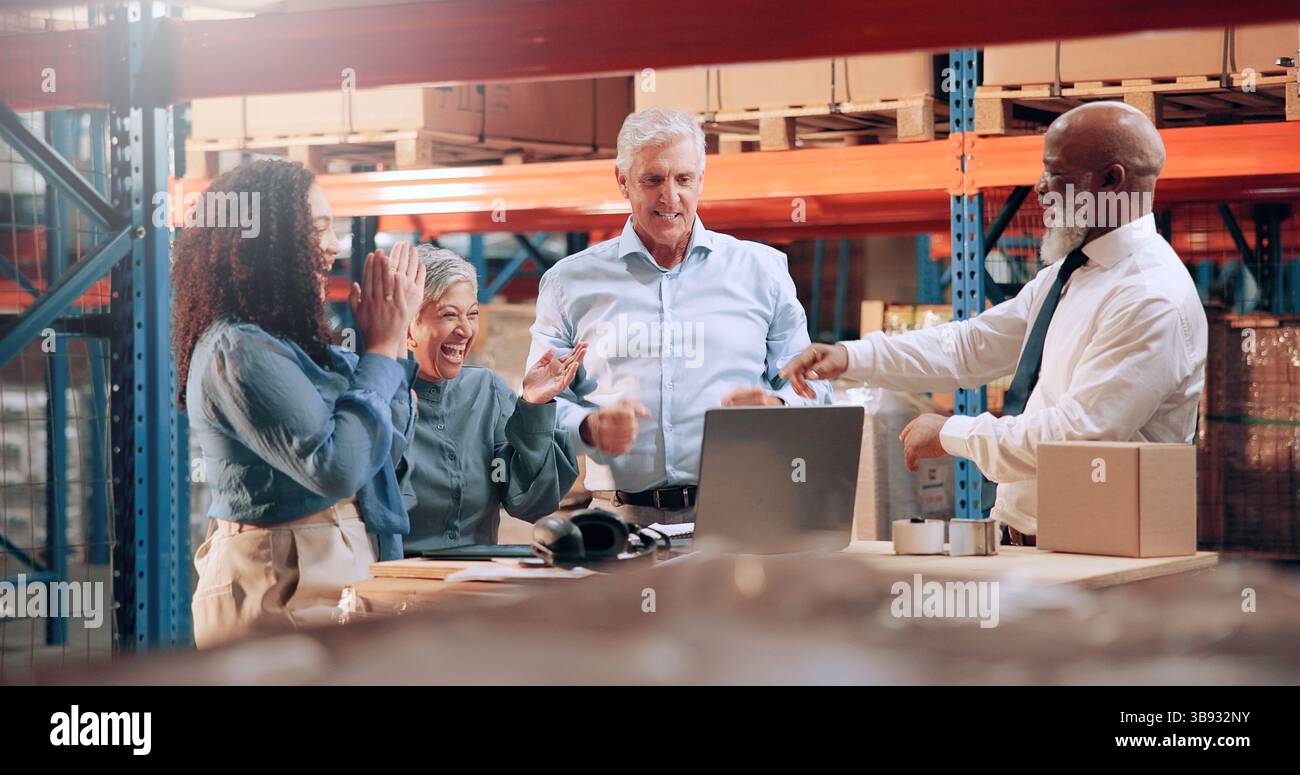 Distribution, people and celebration in warehouse, laptop and ...