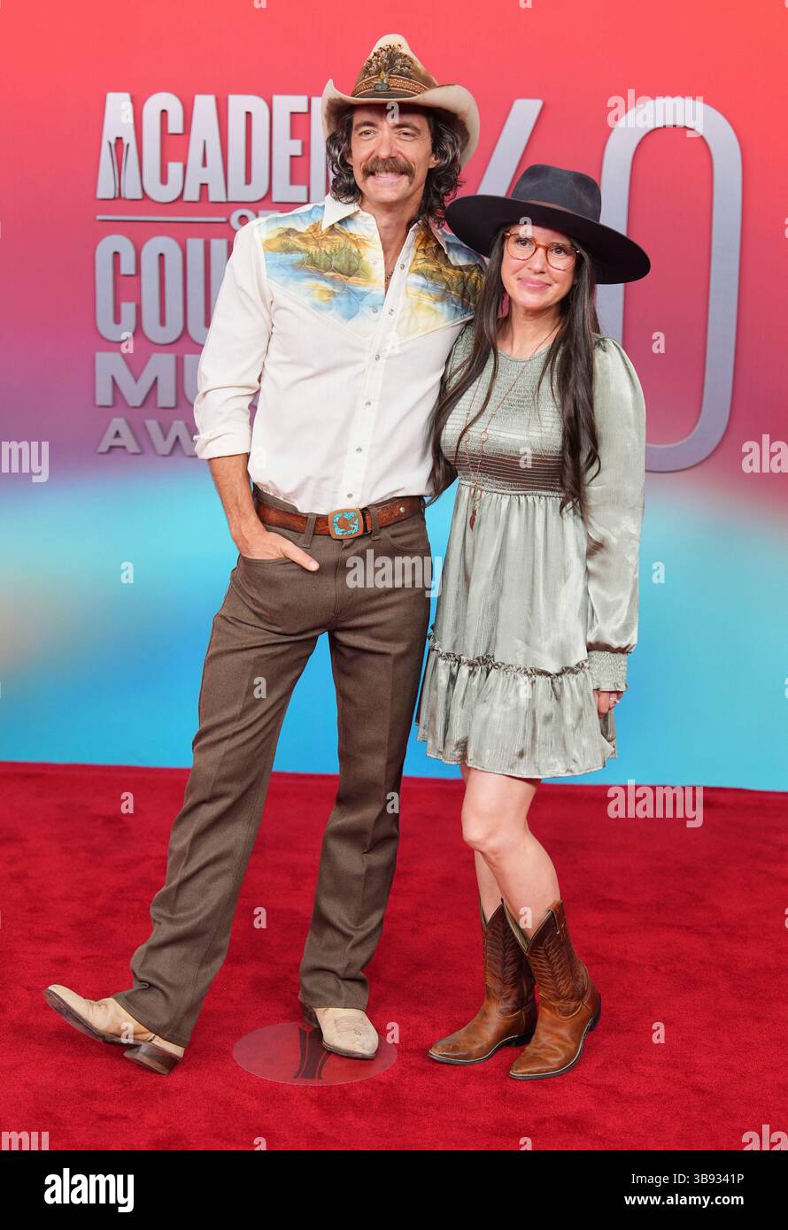 Zane Williams, left, and Jodi Smith Williams arrive at the 60th annual Academy of Country Music ...