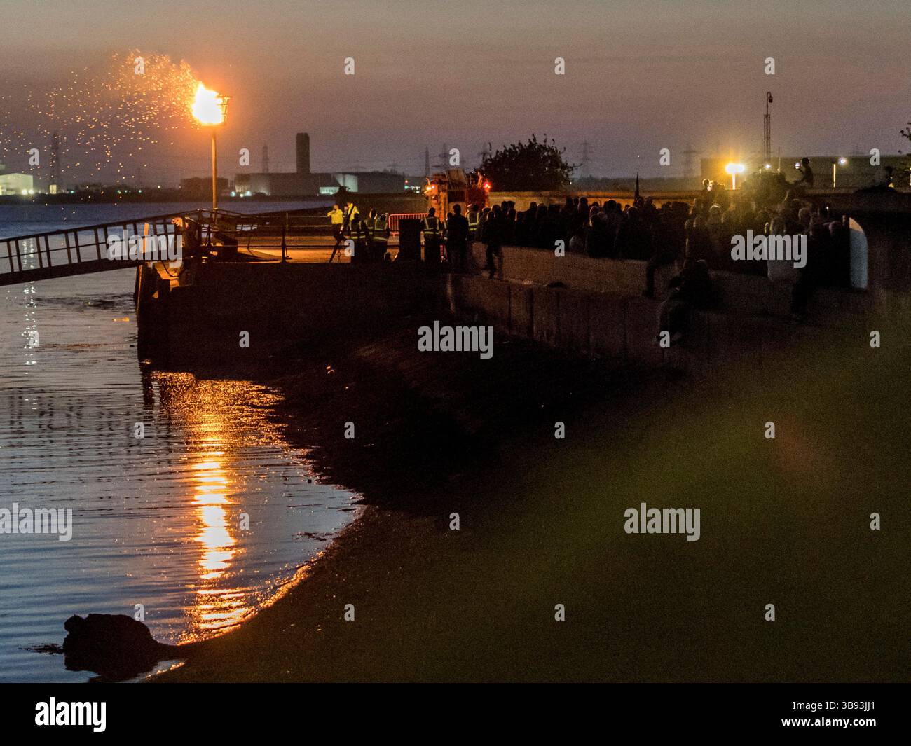 Queenborough, Kent, UK. 8th May, 2025. 80th VE Day: the lighting of the ...